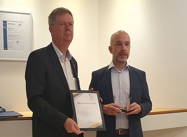 Verleihung des DIN-Exzellenz-Preises an Dr. Mario Schacht